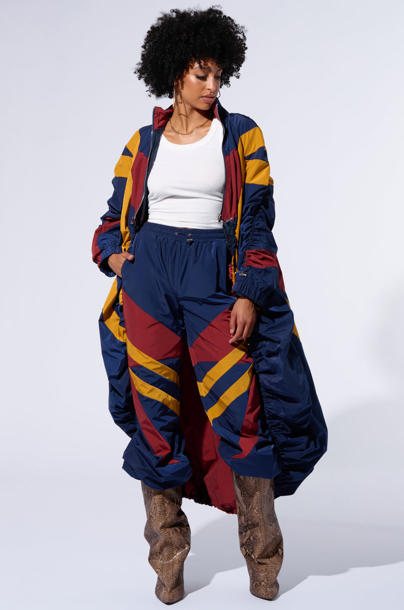BORN TO RUN WINDBREAKER JOGGERS – AKIRA