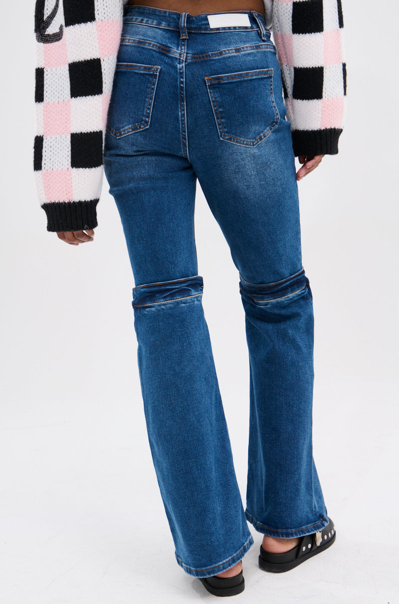 LIE TO ME EXPOSED KNEE DENIM JEANS – AKIRA
