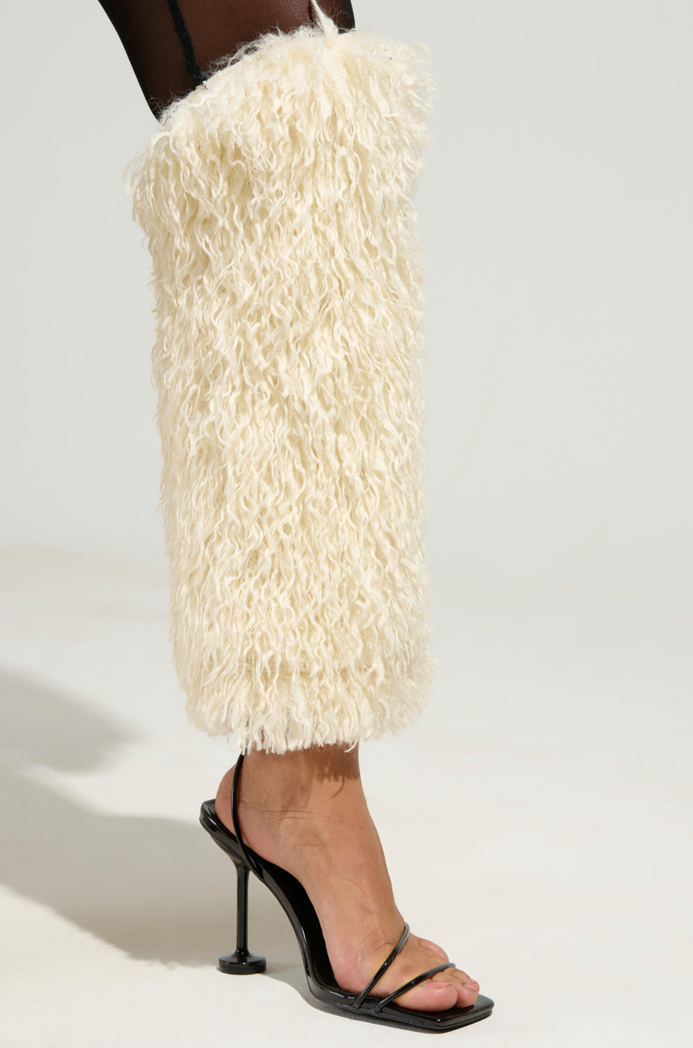 ANNIKA MESH AND FUR JUMPSUIT – AKIRA